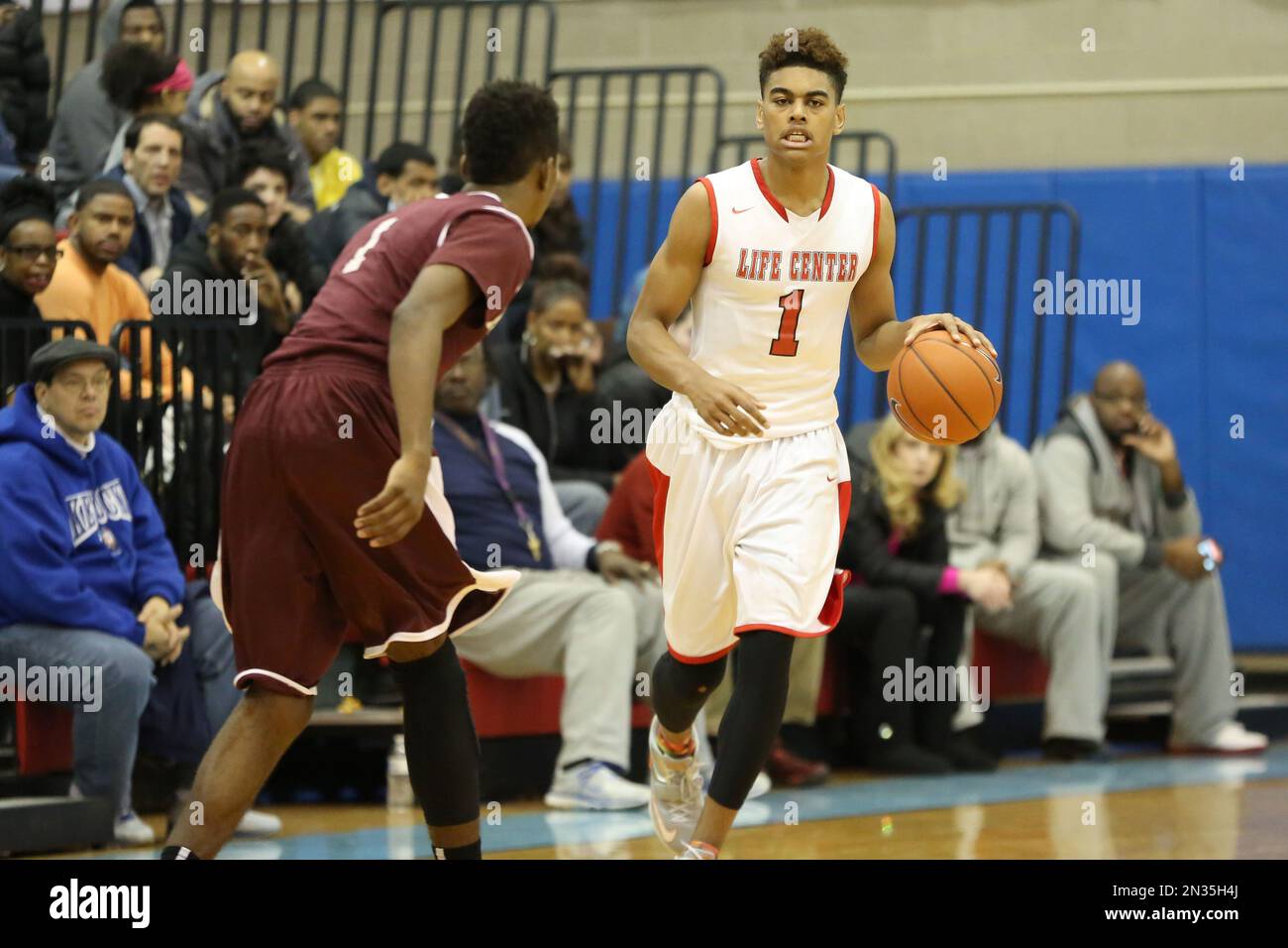 Life Center's Malik Ellison #1 in action against MacDuffie during their ...