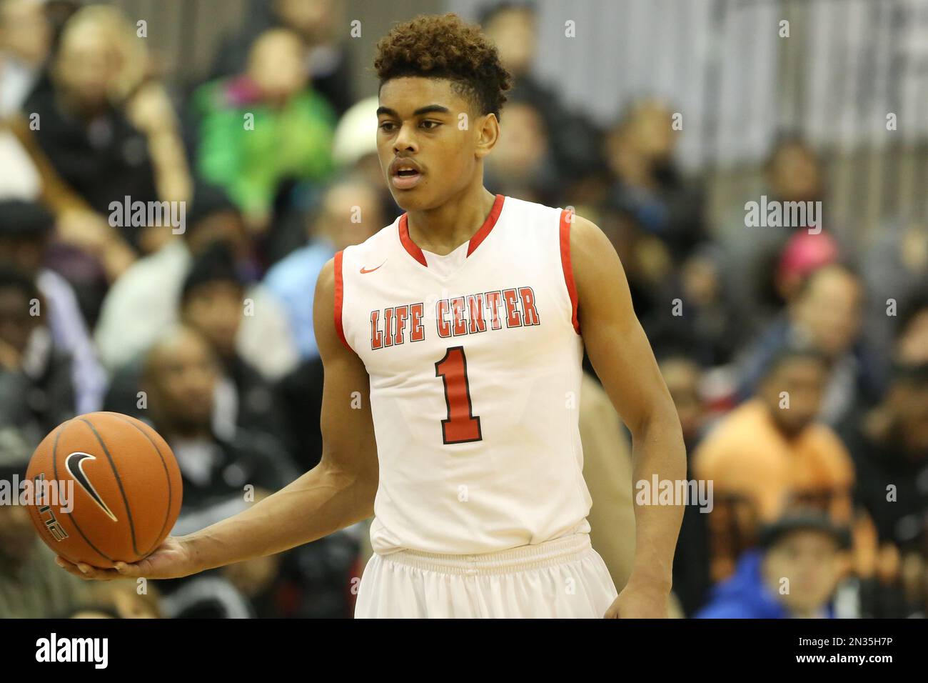 Life Center's Malik Ellison #1 in action against MacDuffie during their ...
