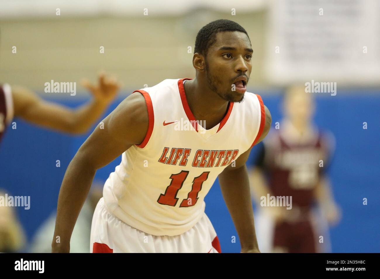 Life Center's Traci Carter #11 in action against MacDuffie during their ...