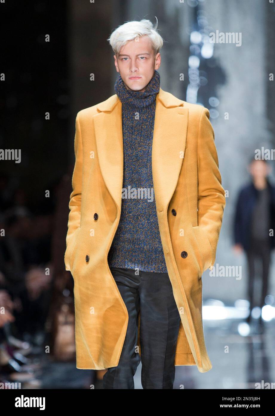 A models wear a creation by Italian designer Alessandro Sartori as part ...