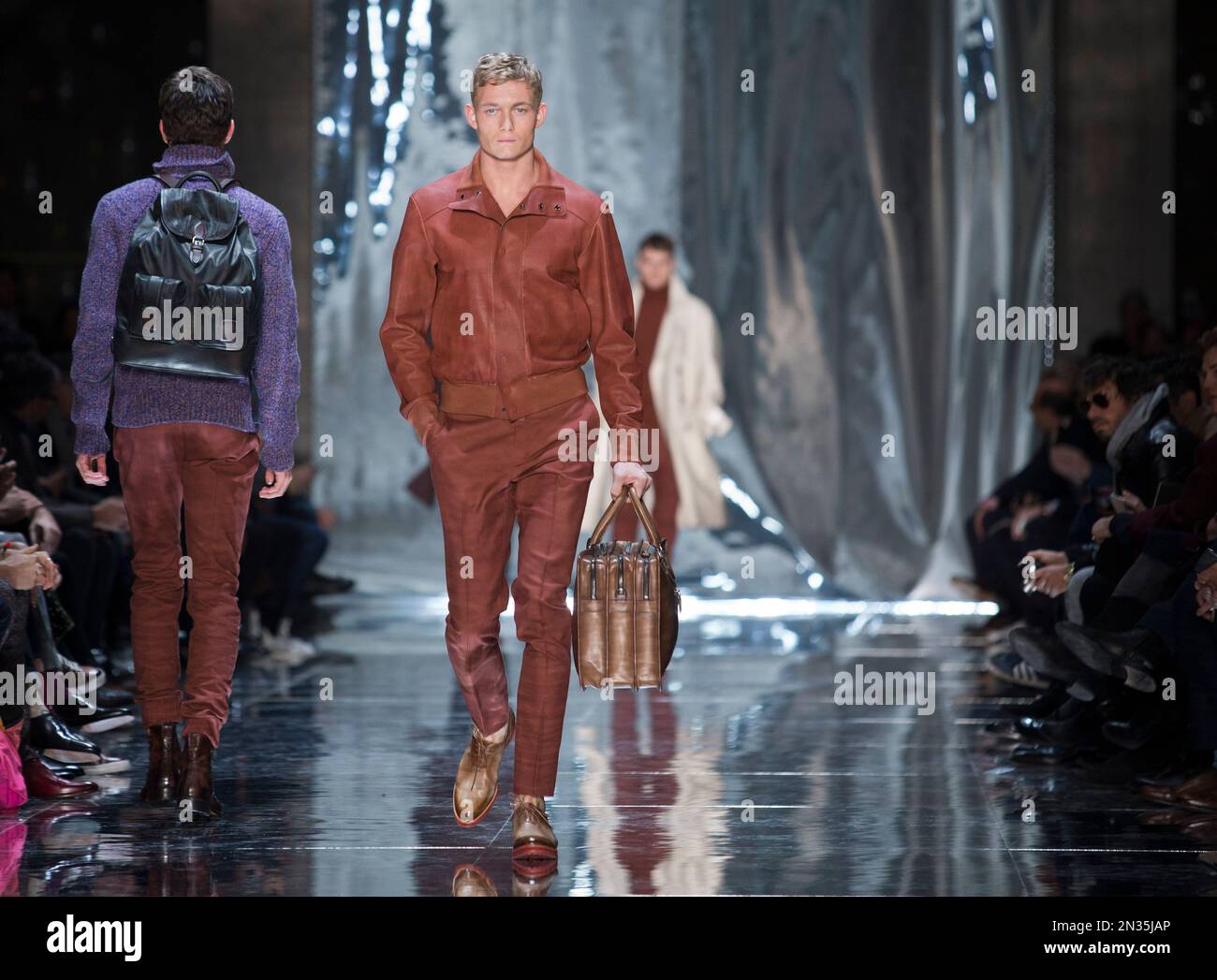 Models wear creations by Italian designer Alessandro Sartori as part of ...