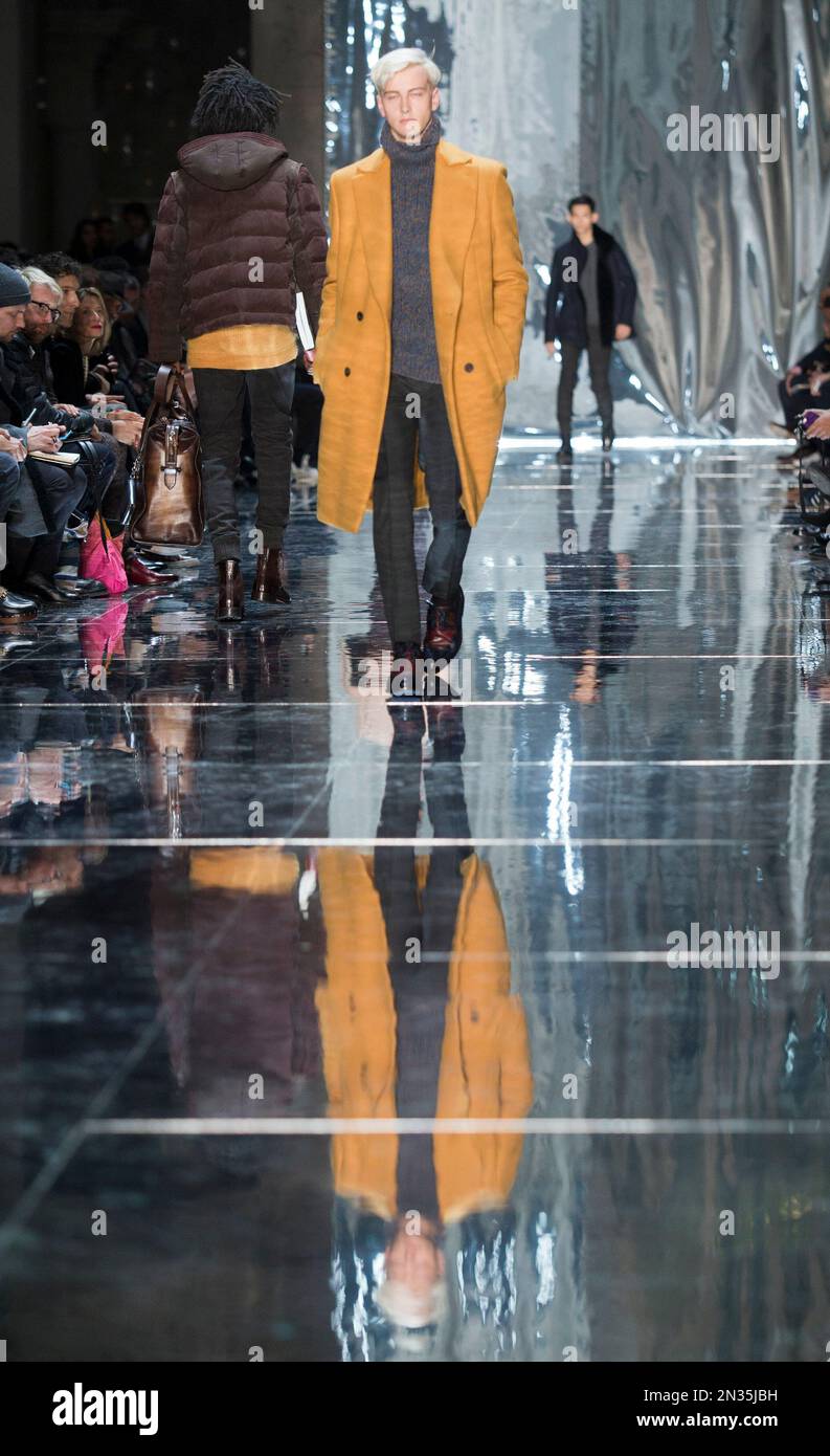 Models wear creations by Italian designer Alessandro Sartori as part of ...