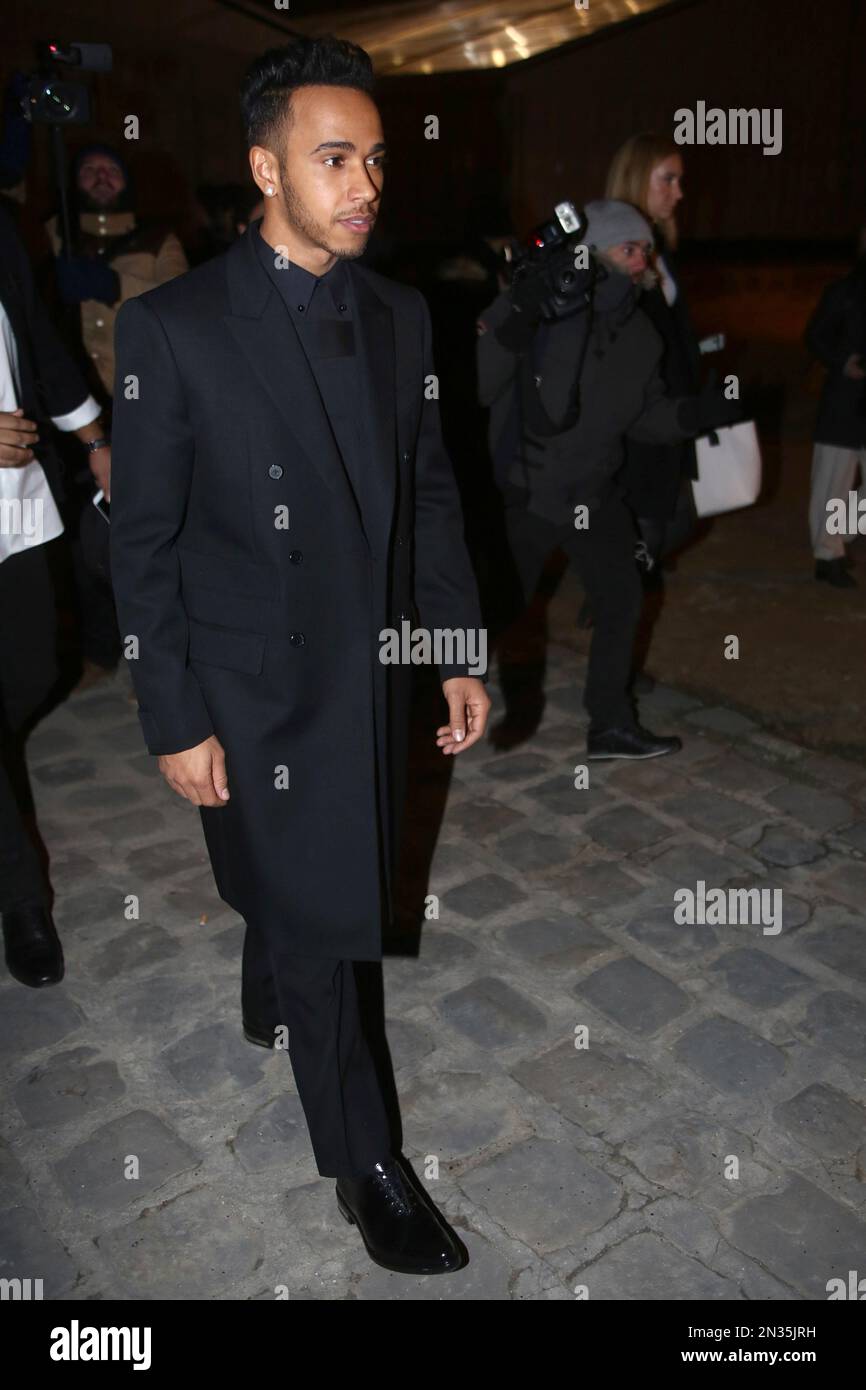 British Formula One driver Lewis Hamilton leaves after the Givenchy's ...
