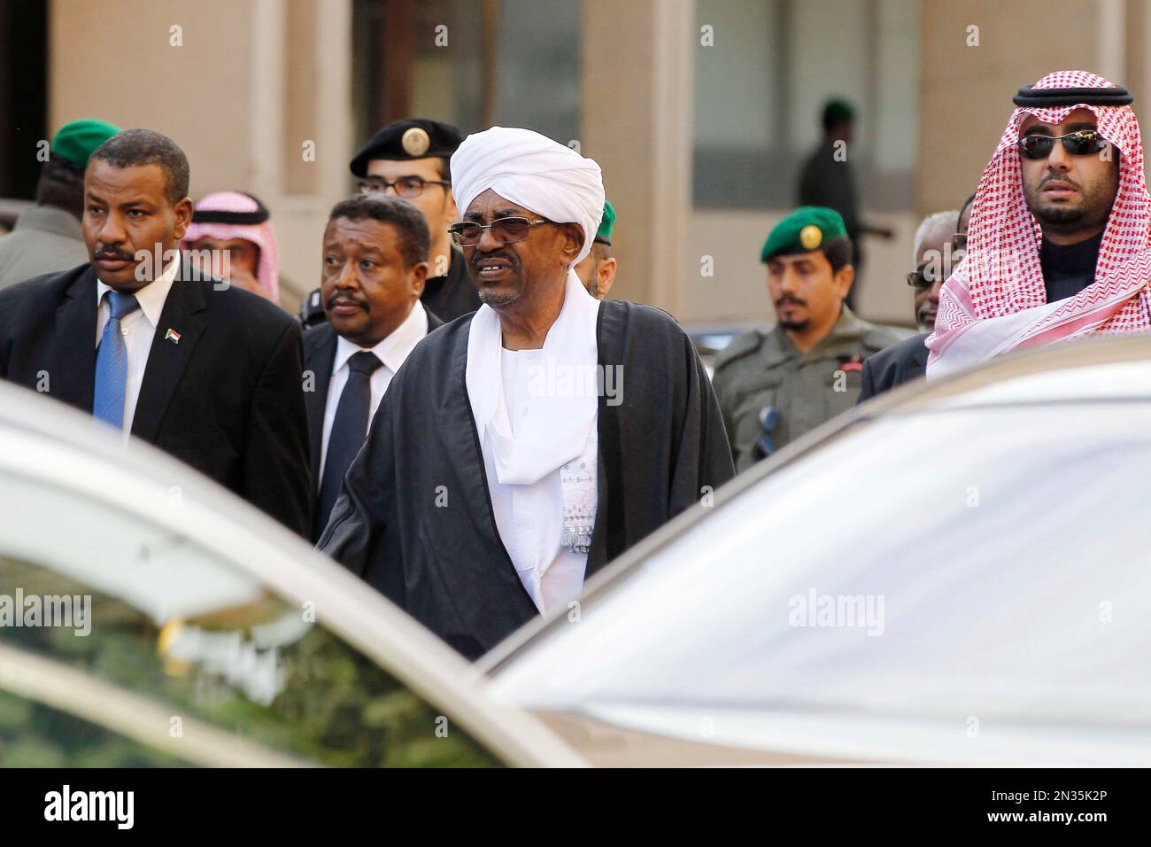 Sudanese President Omar al-Bashir, center, arrives at the Imam Turki bin Abdullah mosque to ...