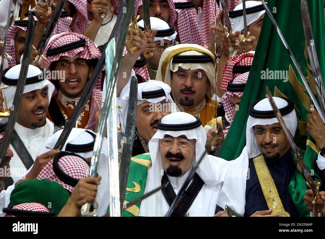FILE - In this March 23, 2010 file photo, King Abdullah, center, of ...