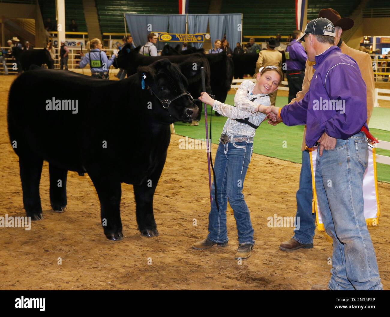 Triniti Scott, center, of Burlington, Colo., is congratulated by Scott ...