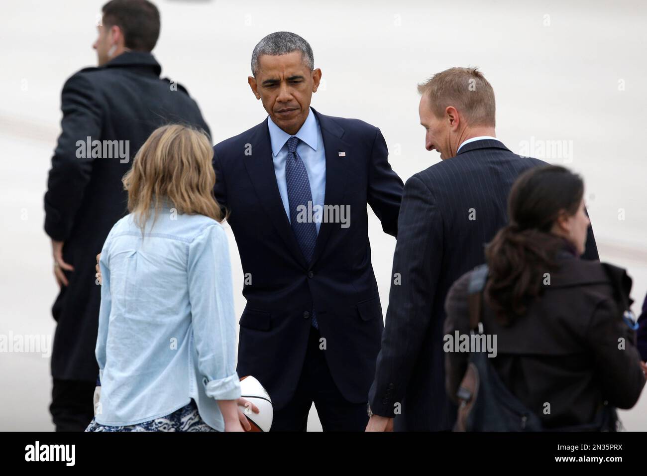 Douglas Pratt, right, his daughter Lindsay Pratt, left, are posed for a ...