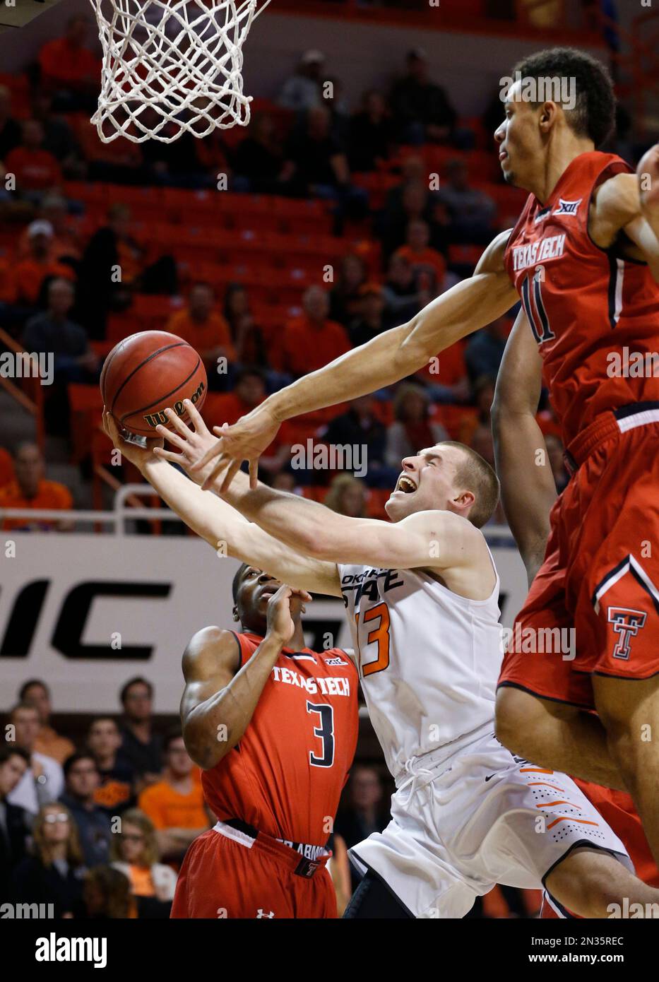 Oklahoma State guard Phil Forte (13) shoots in front of Texas Tech ...
