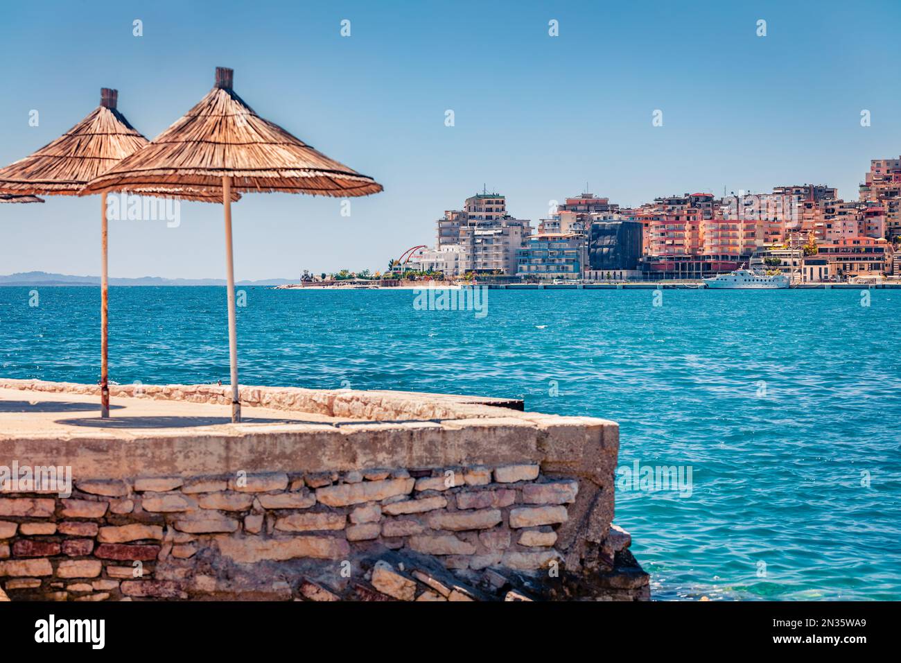 Sunny spring cityscape of Saranda tiwn. Amazing summer view of Albanian ...