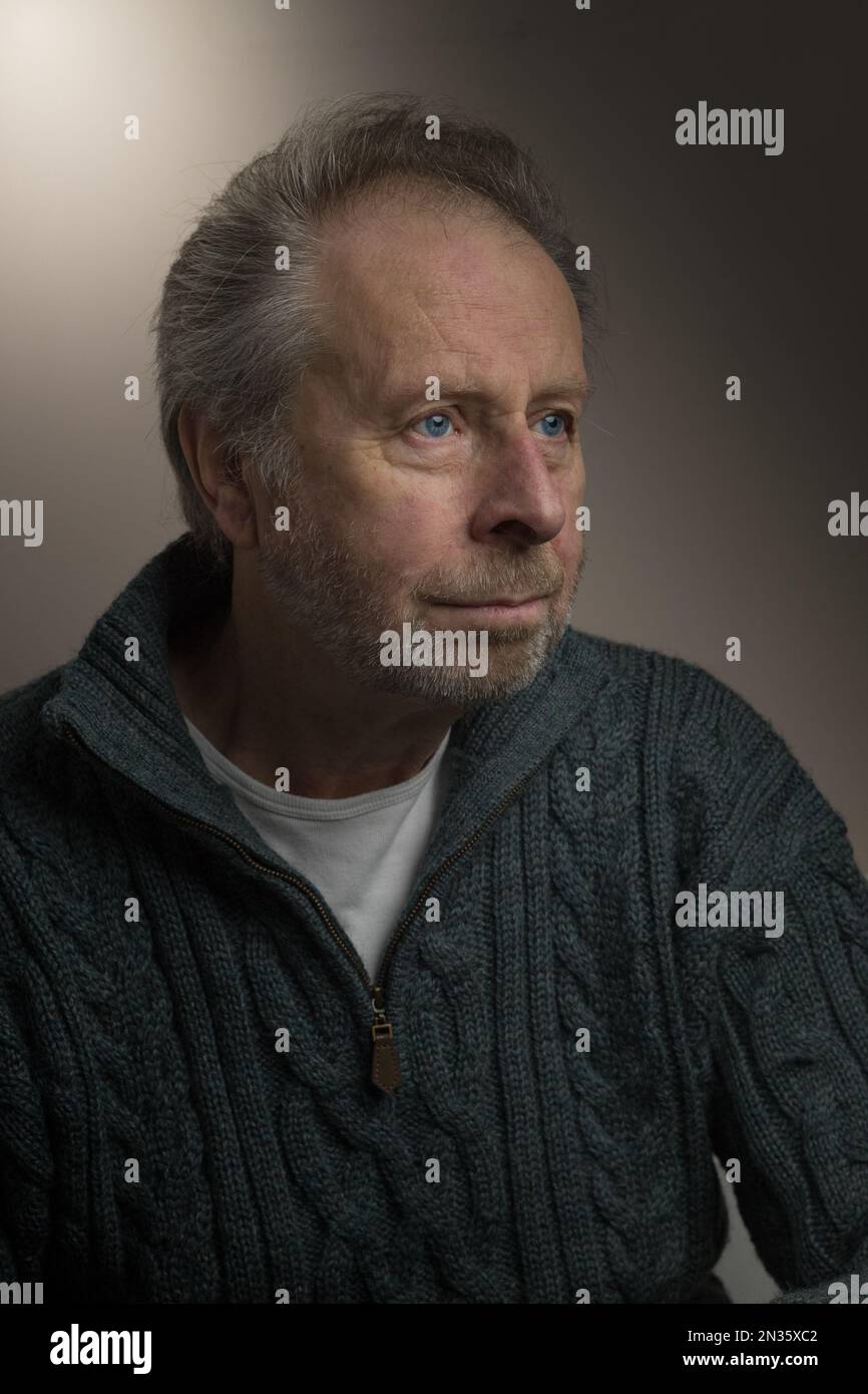 Head shot head and shoulders portrait of attractive mature senior older ...
