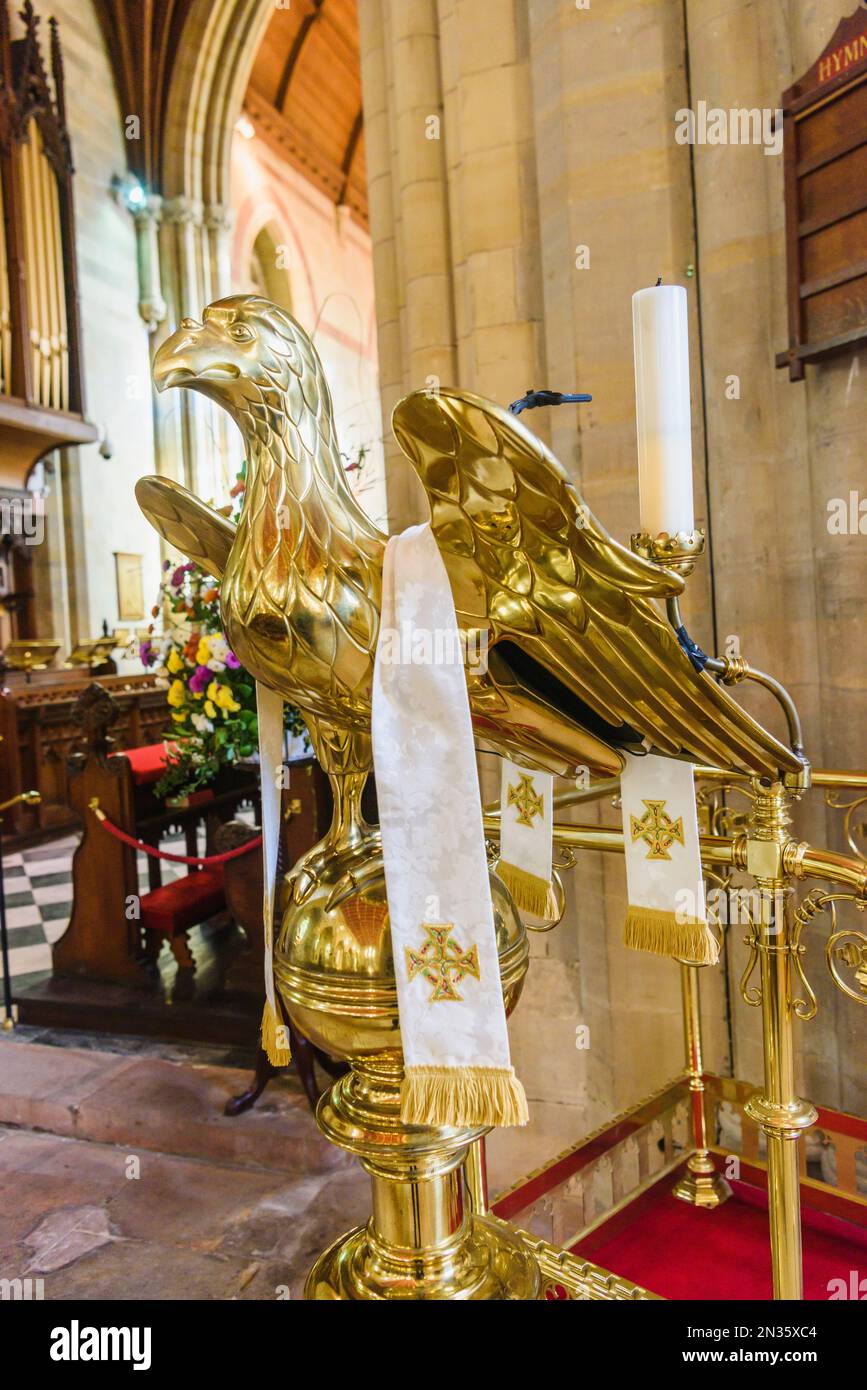 Brass eagle pulpit inside a church Stock Photo - Alamy