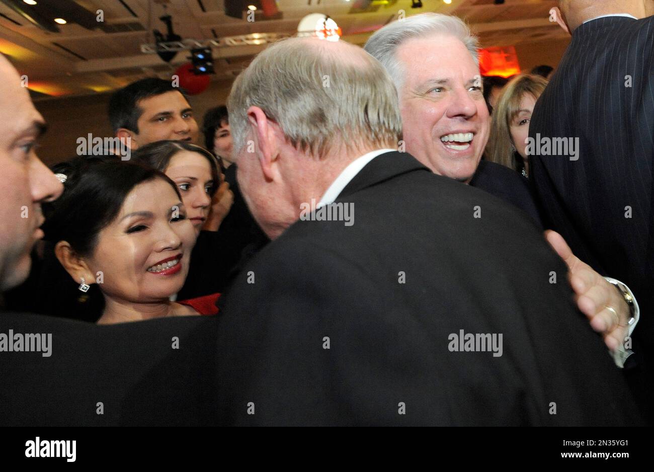 Maryland Gov. Larry Hogan, right, and his wife Yumi, left, greet ...