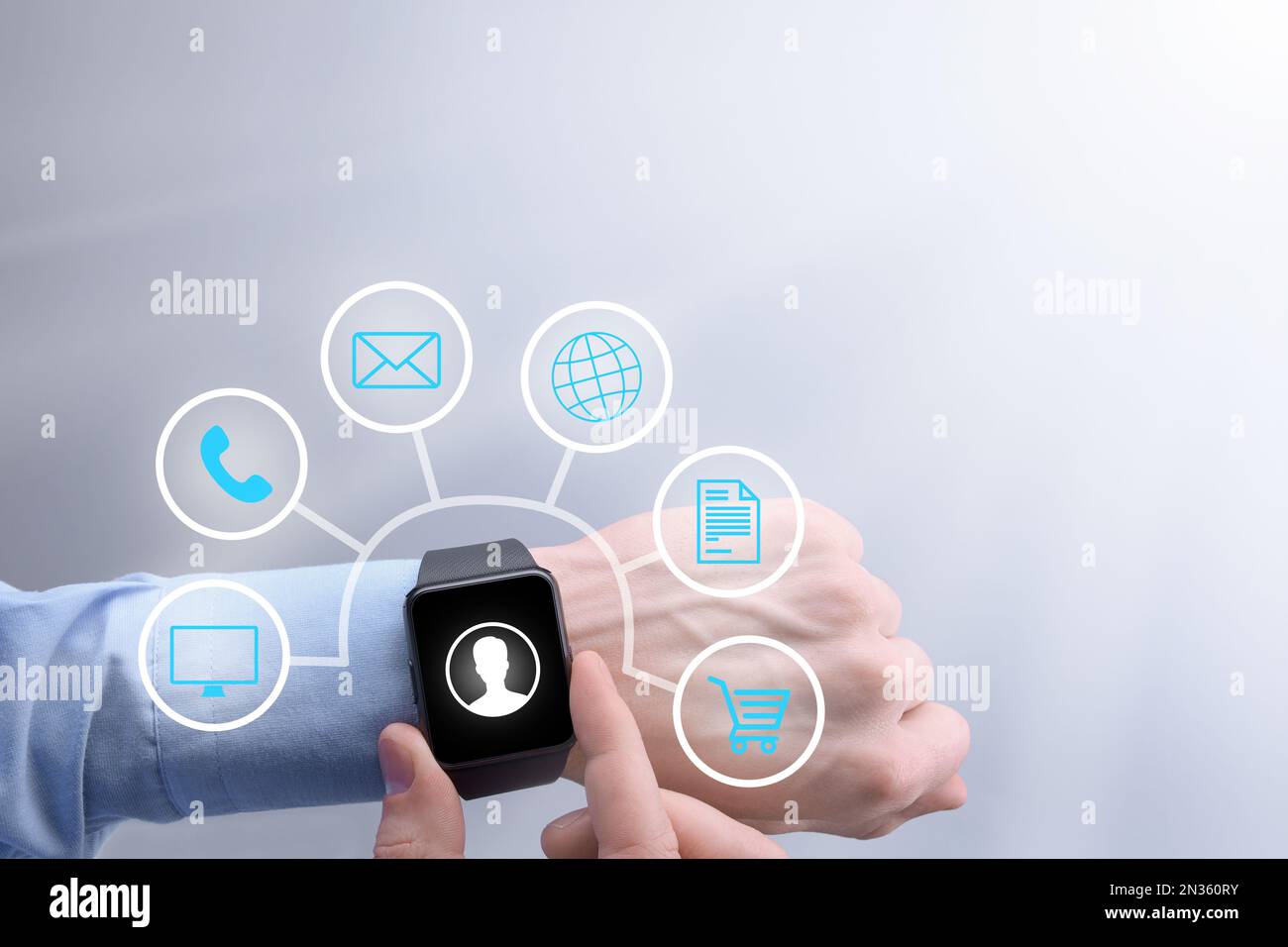 Smart watch on a businessman's hand. The guy chooses in the menu ...