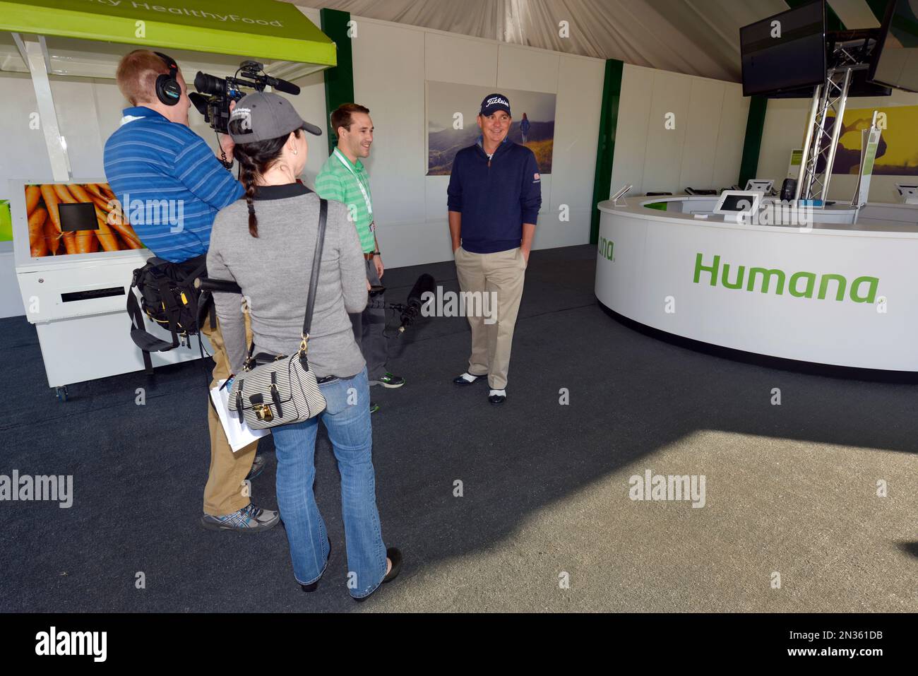 PGA TOUR professional player Jason Dufner, right, takes a tour of the ...