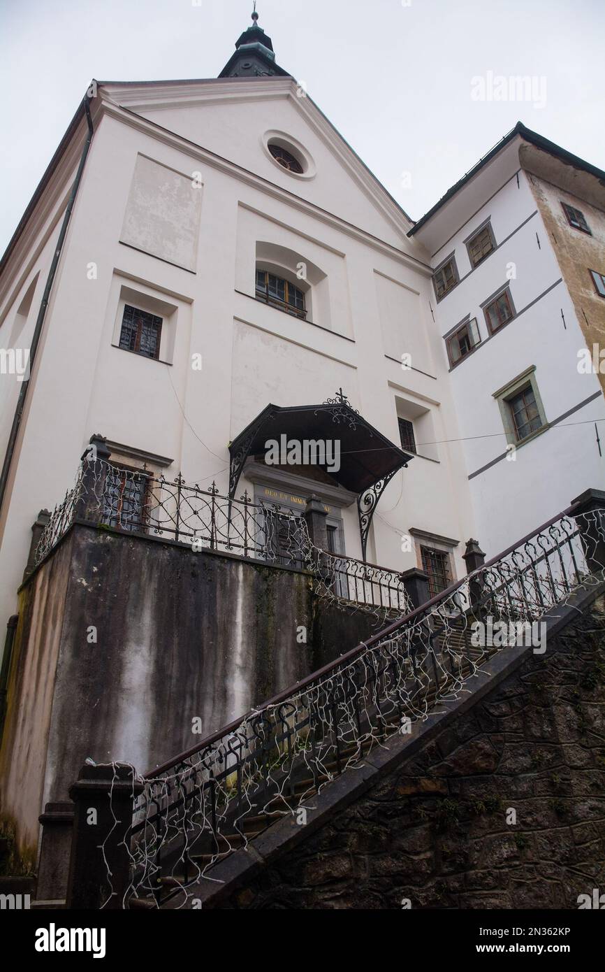 The Church of Mary Immaculate in the historic centre of Skofja Loka in ...