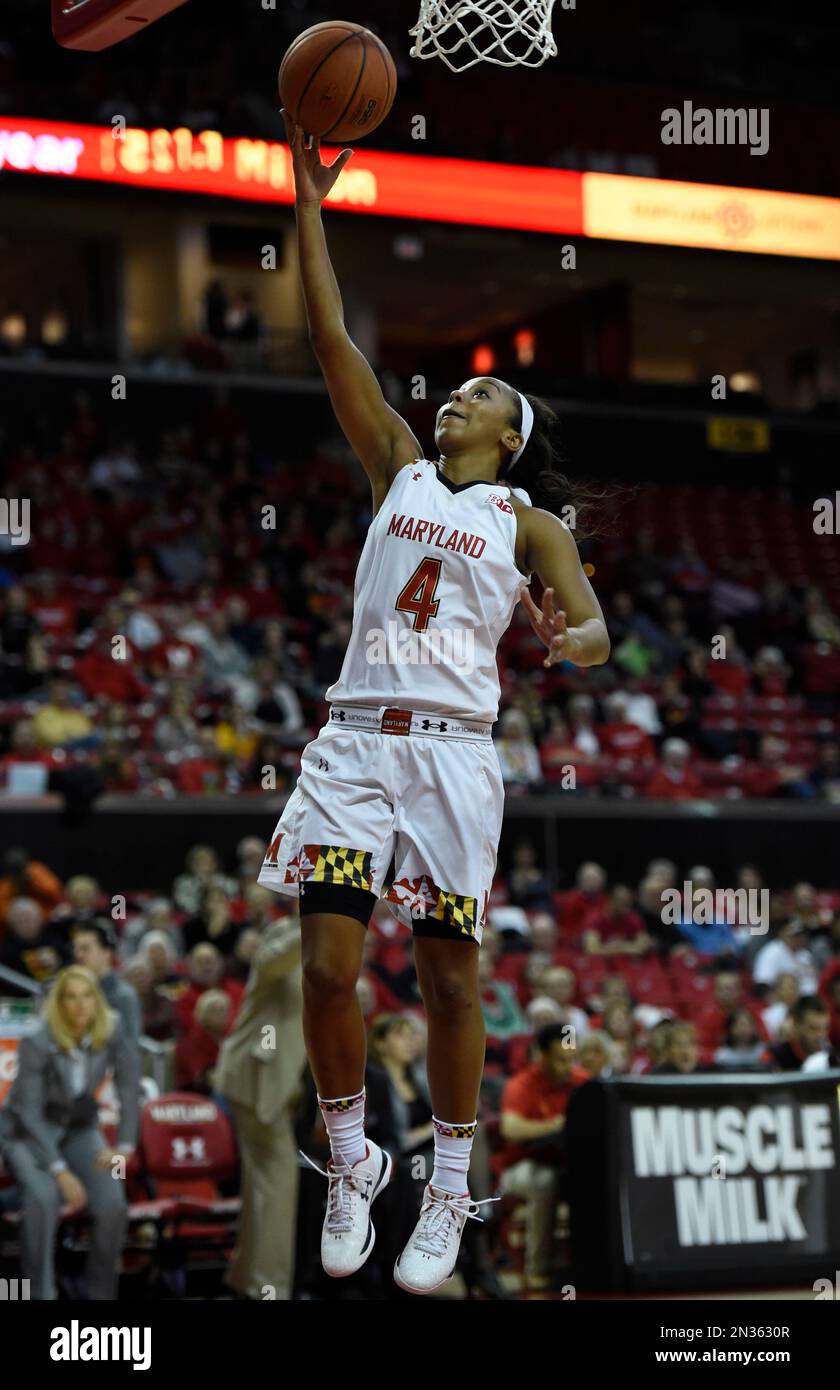 Maryland guard Lexie Brown, right, shoots and scores against Illinois ...