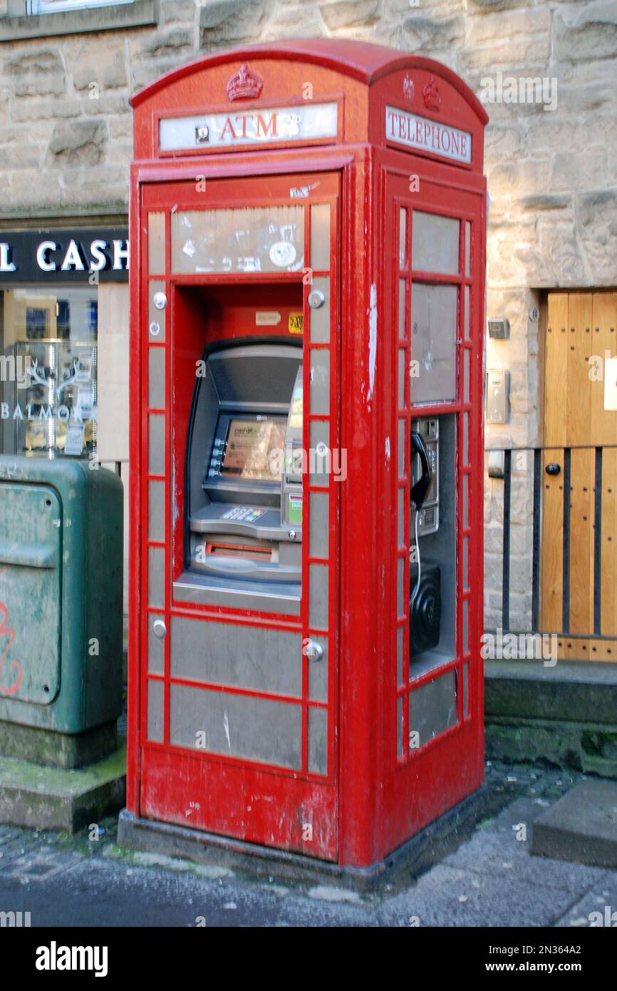 A red telephone box in Edinburgh Scotland (in the Royal Mile area),that ...