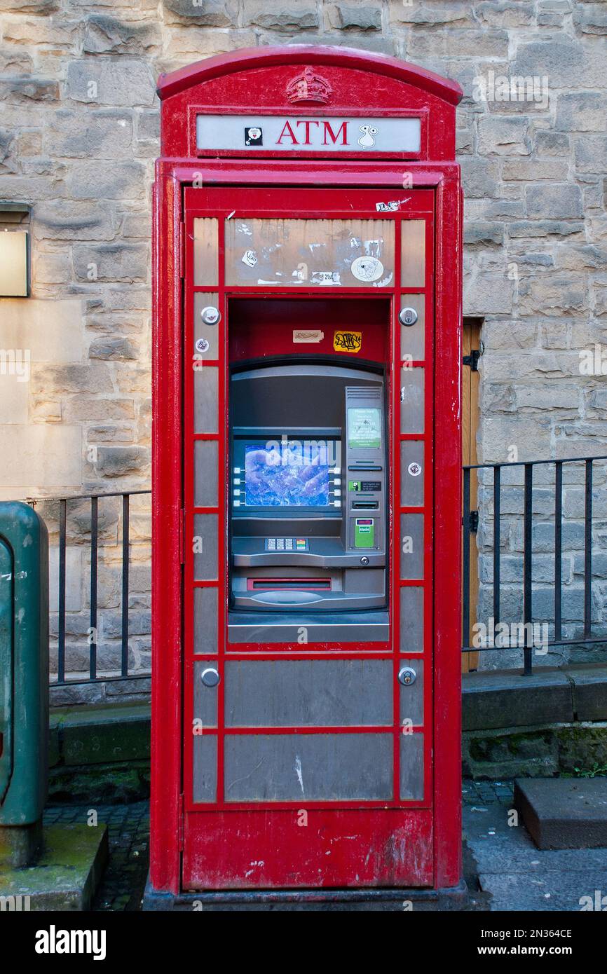 A red telephone box in Edinburgh Scotland (in the Royal Mile area),that ...