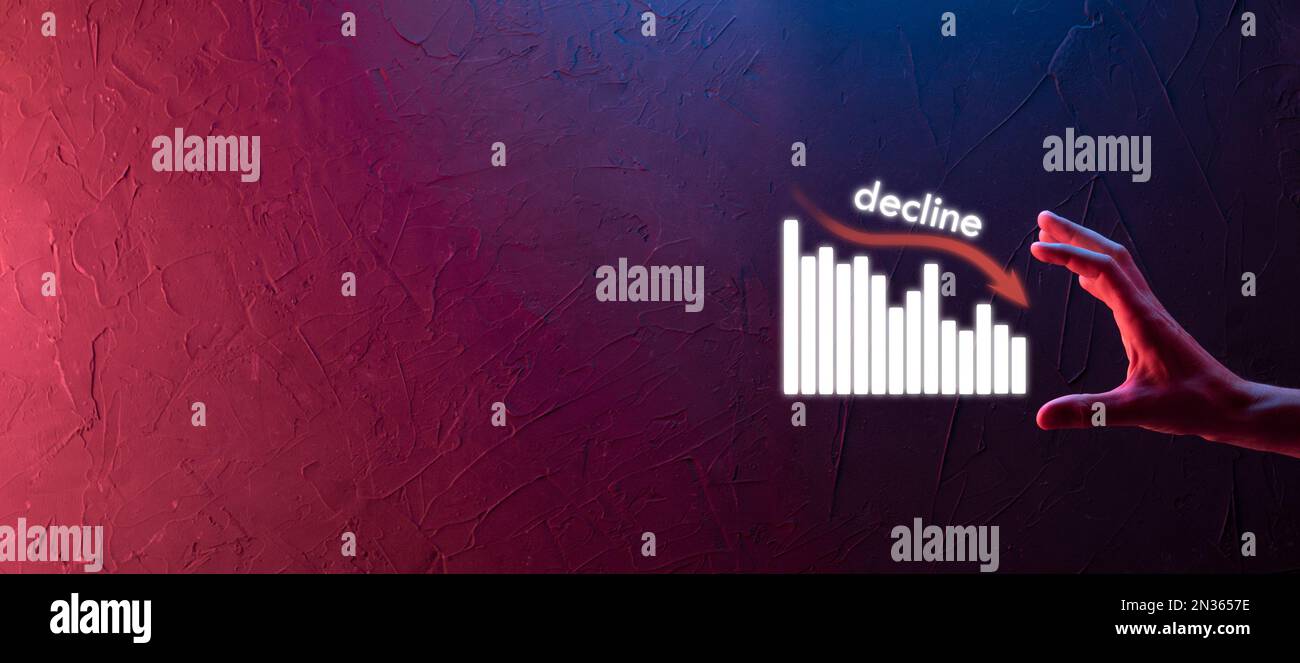 Business man holding holographic graphs and stock.Decline, decrease, down, drop. Business ...
