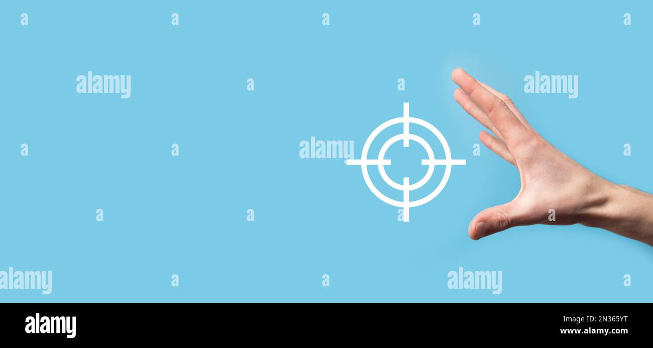 Targeting concept with hand holding target icon dartboard sketch on ...
