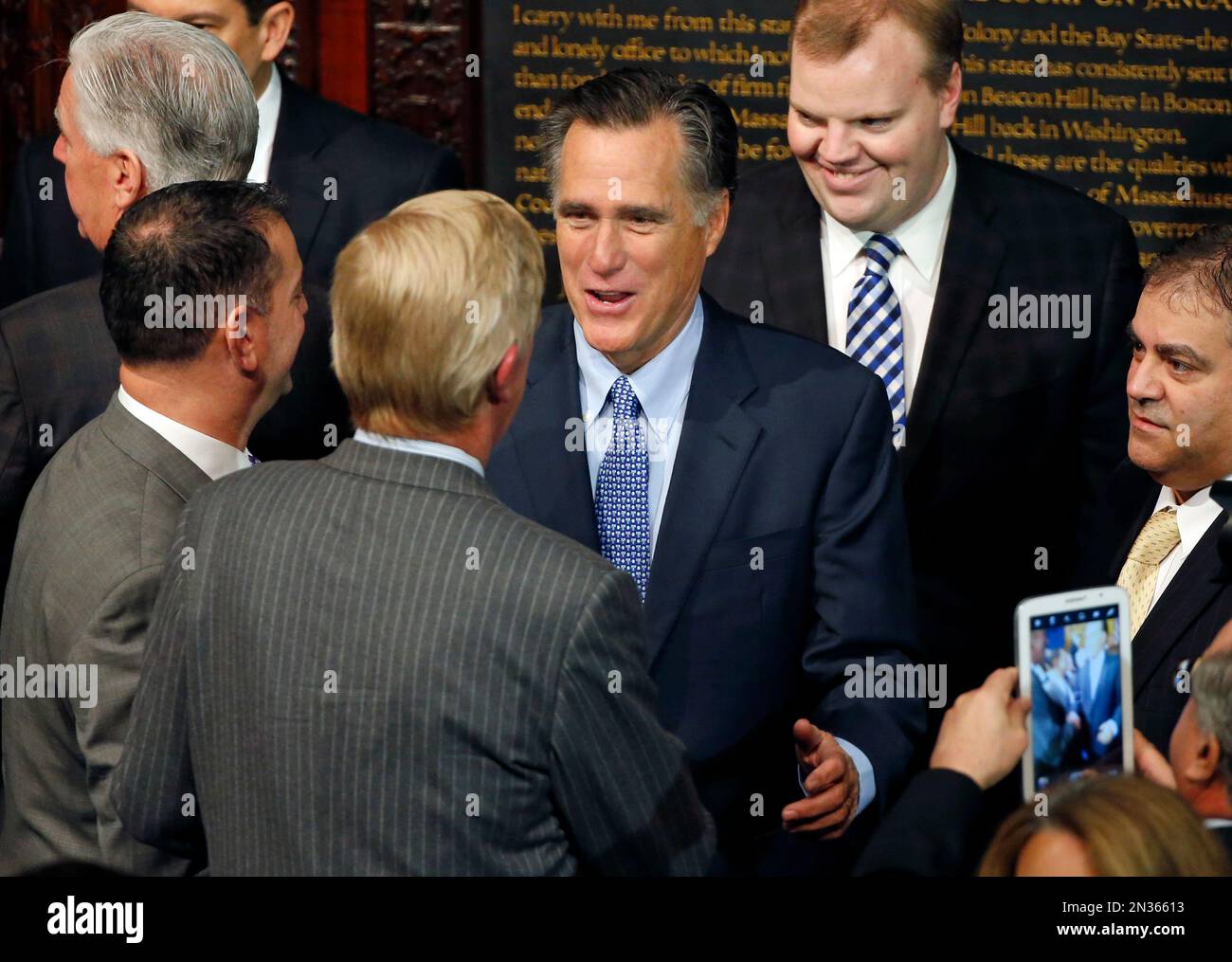 Former Massachusetts Governor Mitt Romney, middle, mingles in the House ...