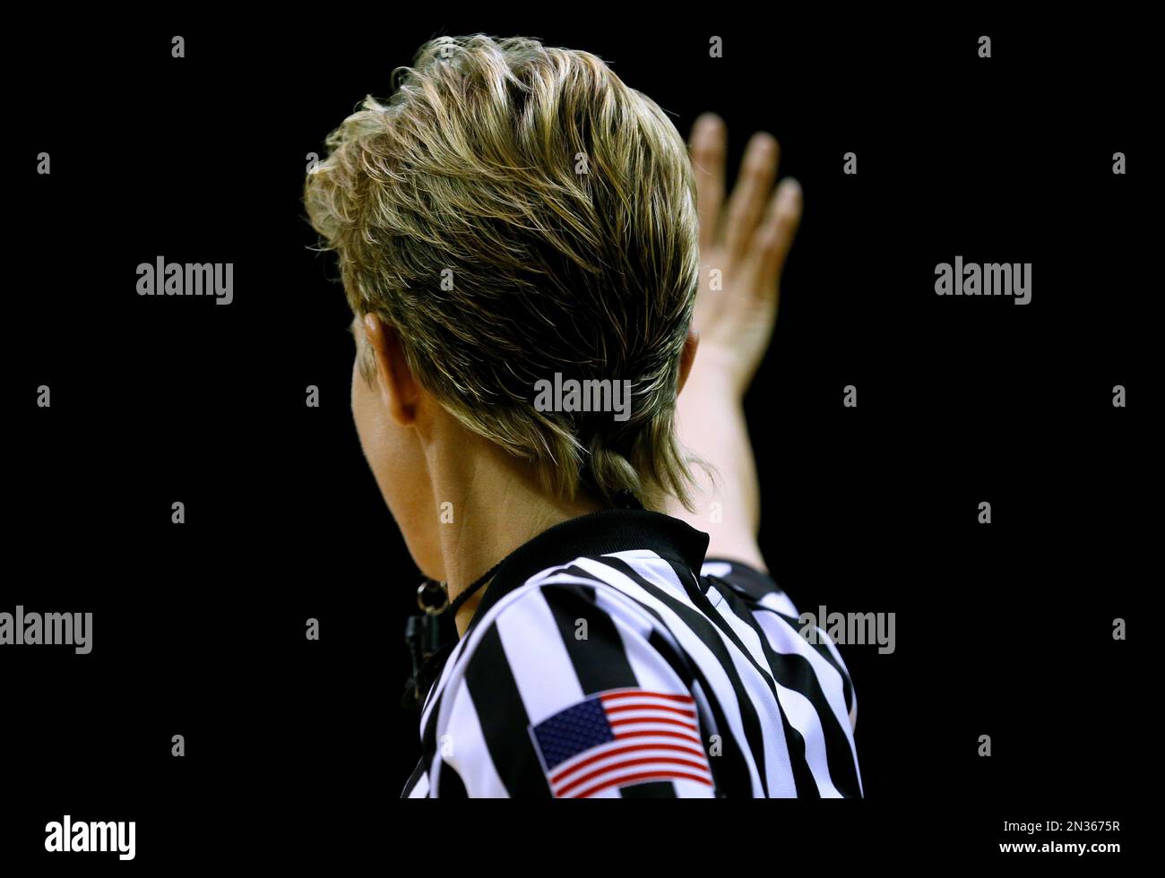 Laura Morris makes a call during an NCAA college basketball game ...