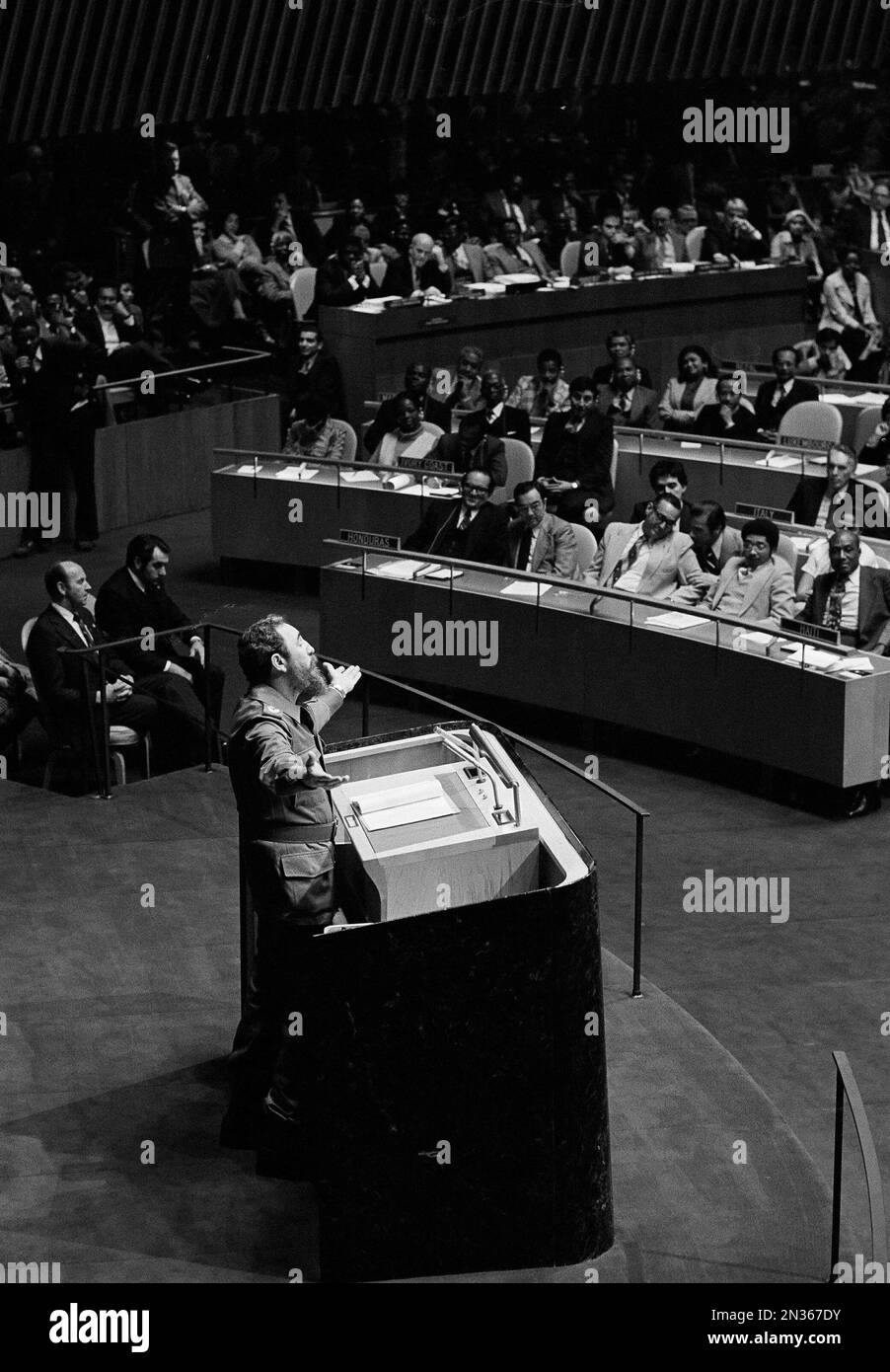 Cuban President Fidel Castro gestures with his arms as delegates of the ...