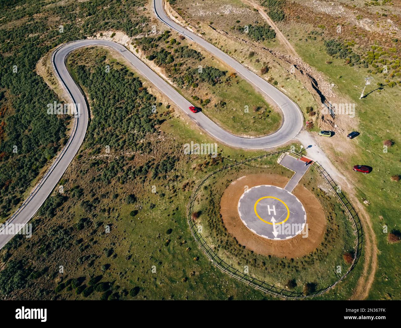 Aerial view of winding road. Splendid morning scene of asphalt roadway ...