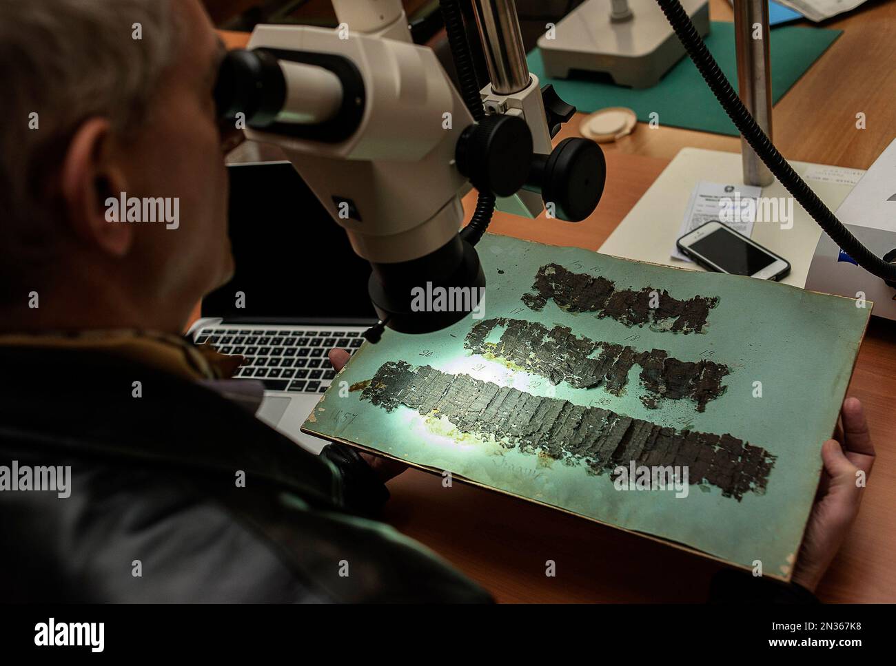 David Blank, professor of Classics from University of California, looks ...