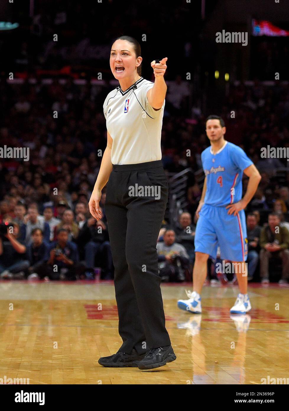 Referee Lauren Holtkamp gestures as Los Angeles Clippers guard J.J ...