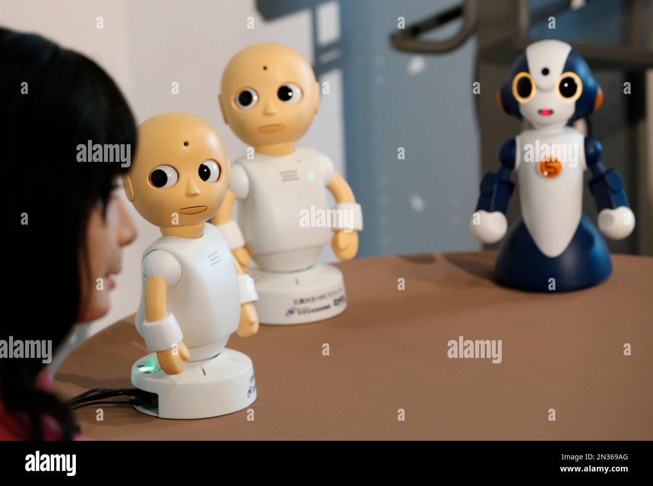 Talking robots, CommU, second left and center, and Sota, right, talk ...