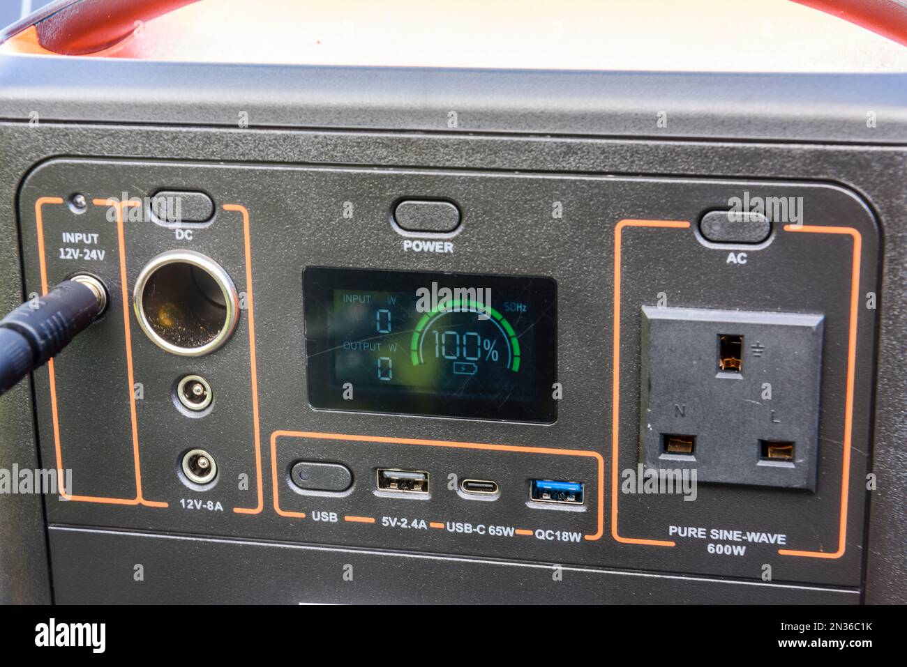 Solar generator battery pack being charged by panels in the sun Stock ...