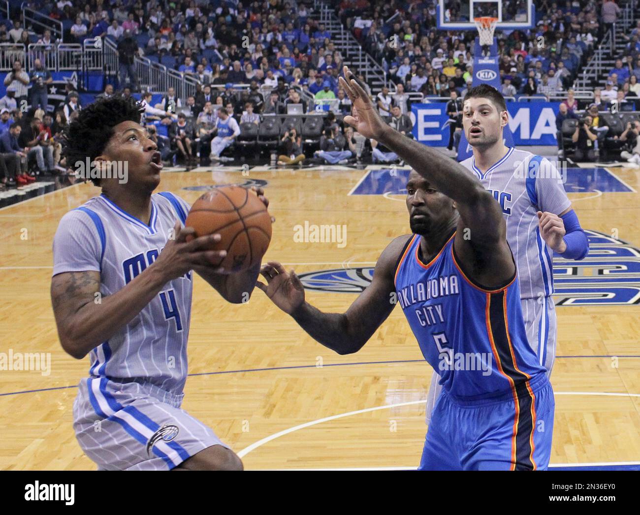 Orlando Magic's Elfrid Payton (4) looks for a shot as he is guarded by ...