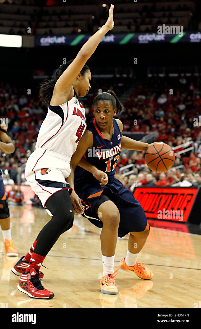 Virginia sophomore guard Breyana Mason (12) works inside against ...