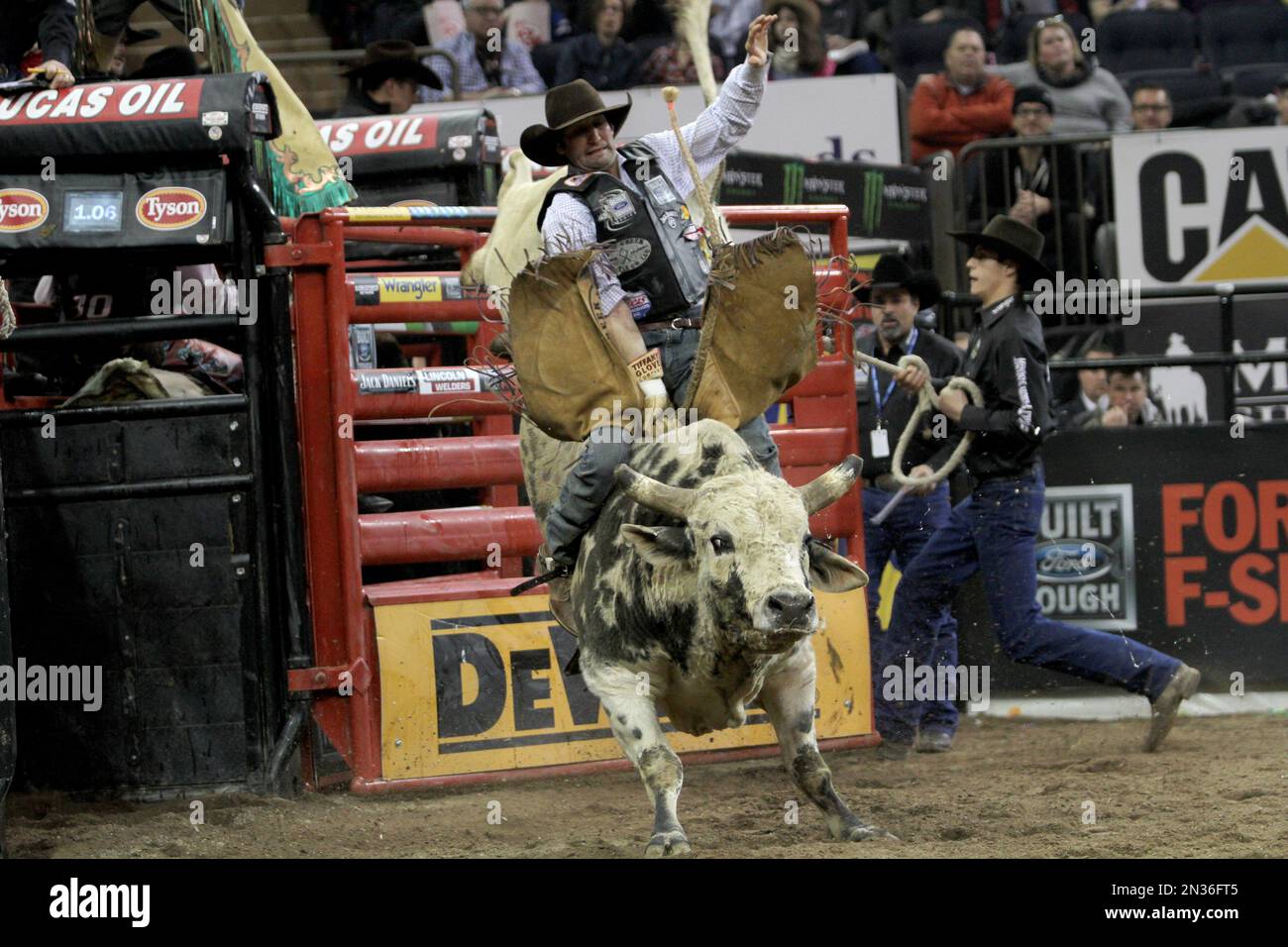 Ben Jones rides Sun Dome during the Professional Bull Riders Buck Off ...