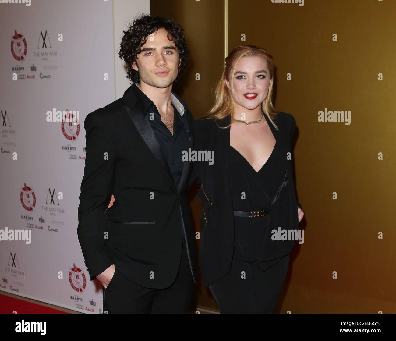 Actors Toby Sebastian and Florence Pugh arrive at the May Fair Hotel in ...
