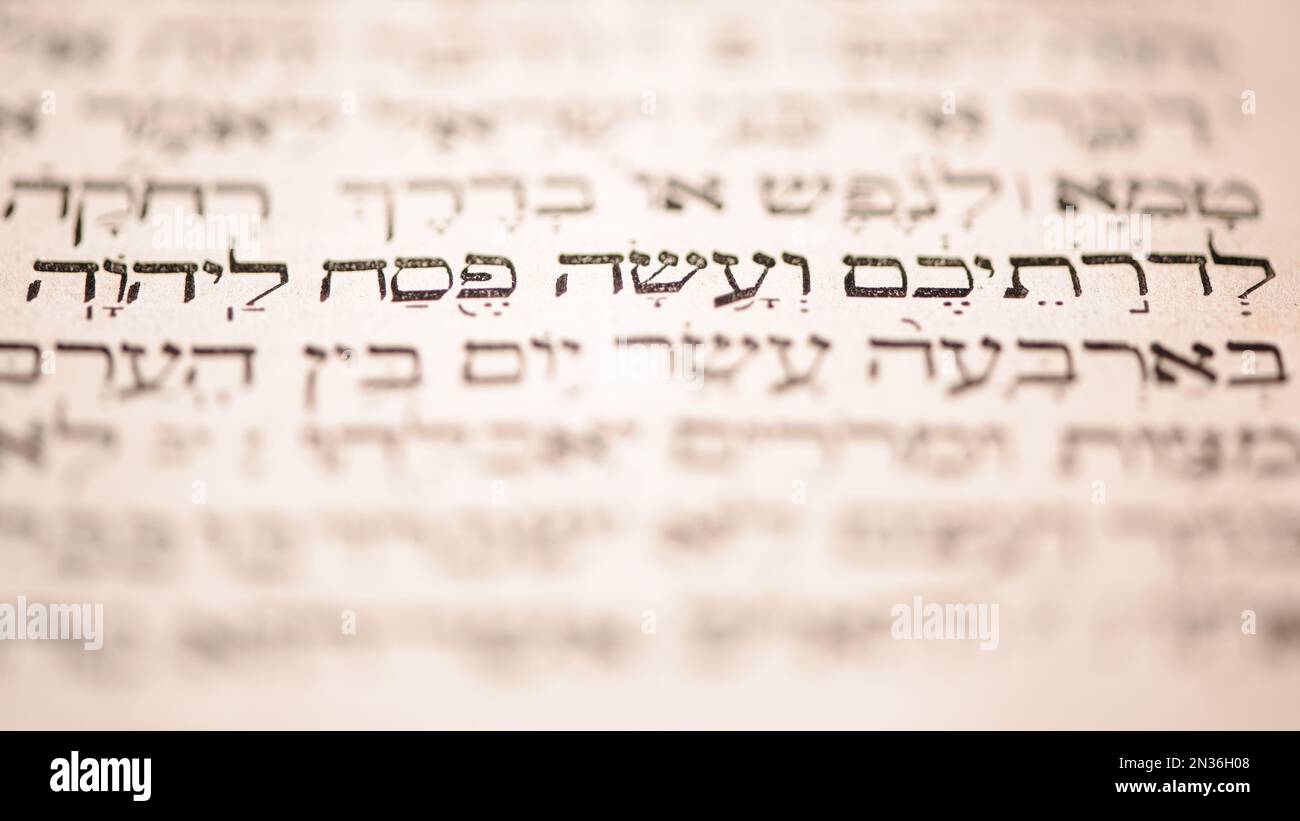 Page of old worn shabby jewish book Torah. Selective focus on snippet ...