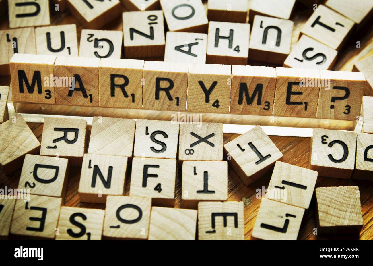 Board Game Pieces Spelling Out Marry Me Stock Photo - Alamy