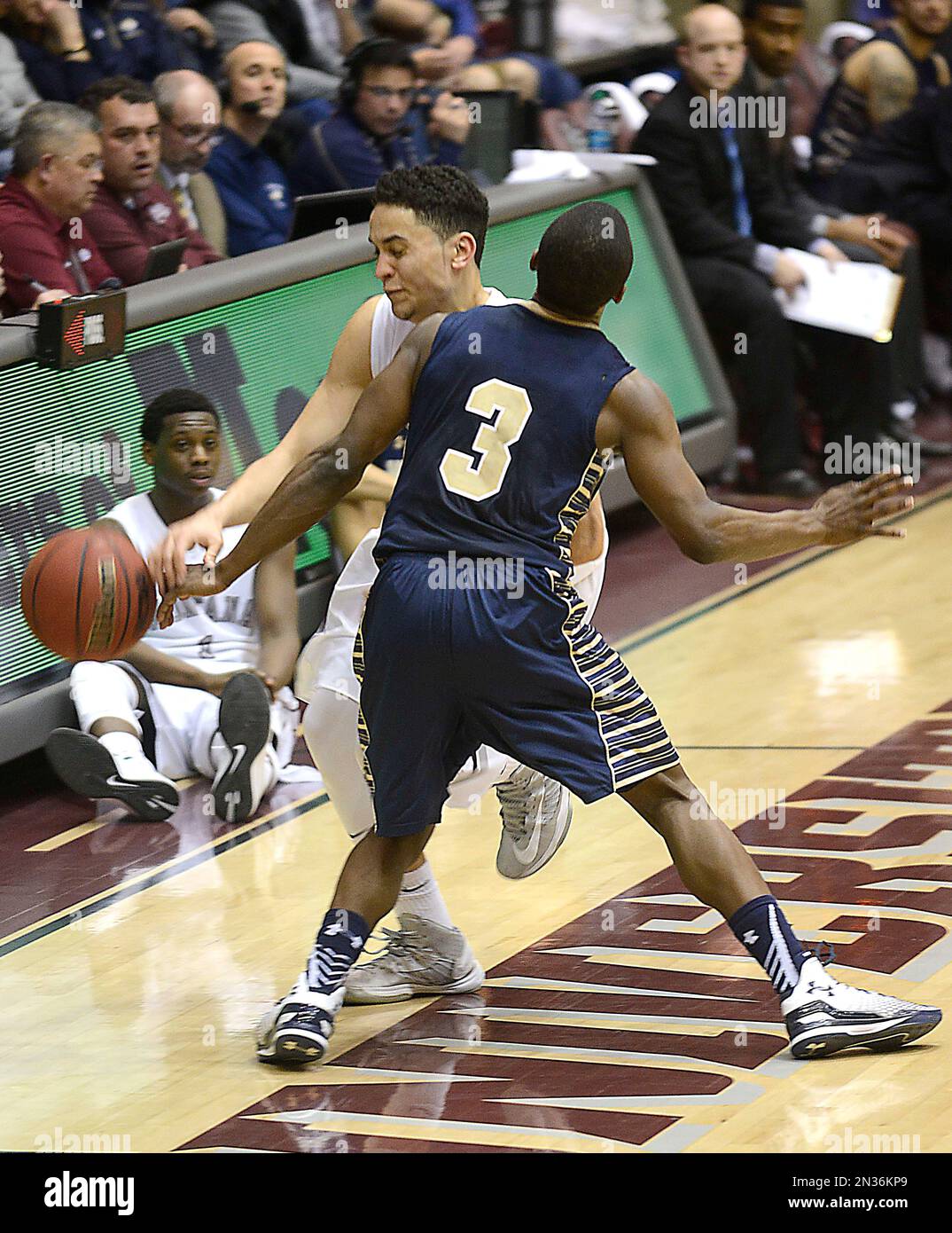 Montana guard Jordan Gregory, center left, collides with Montana Sate ...