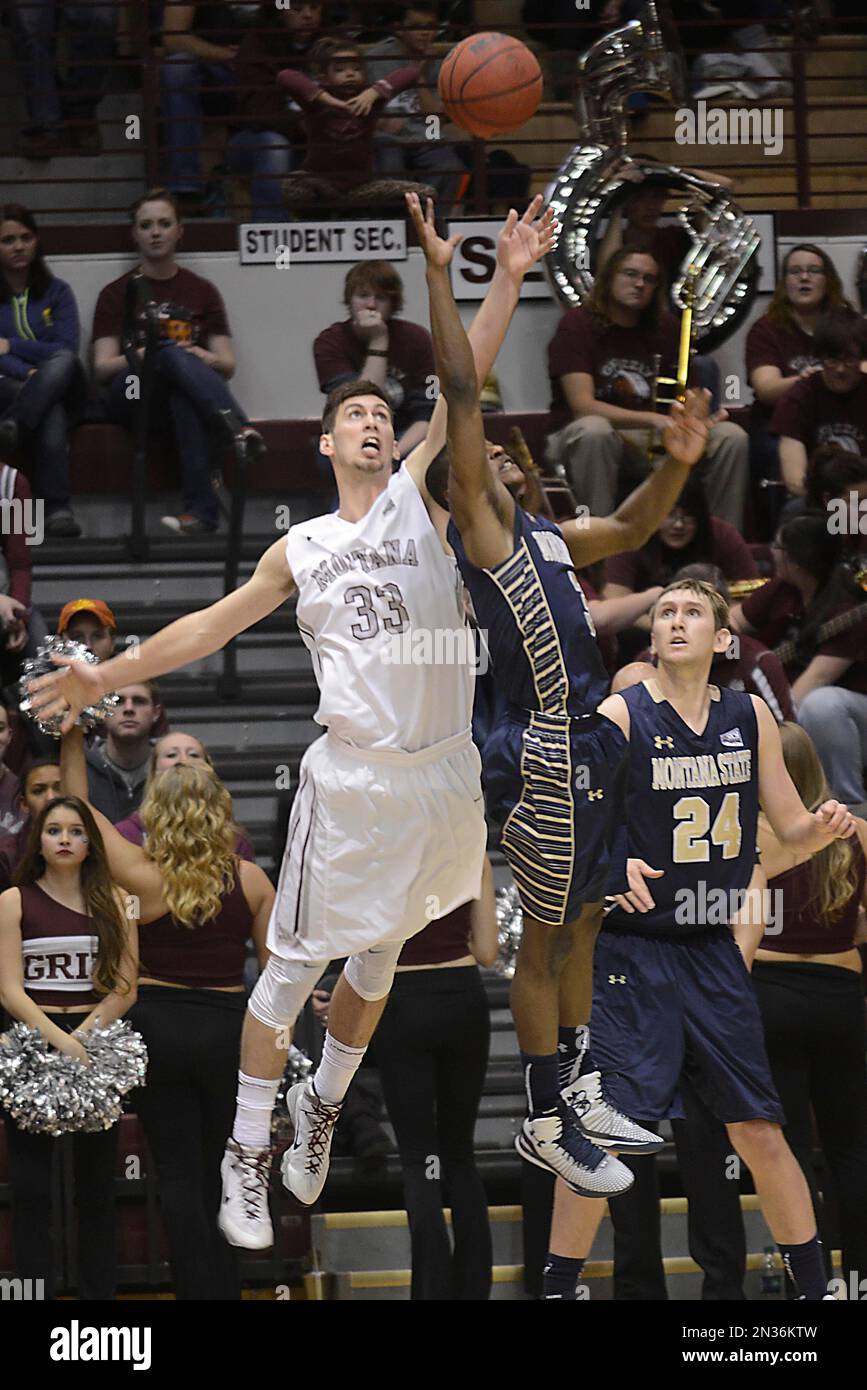 Montana forward Mike Weisner (33) and Montana State guard Michael Dison ...