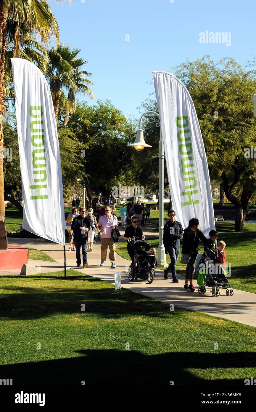 Local residents participate in the Humana Well-Being Walk during the ...