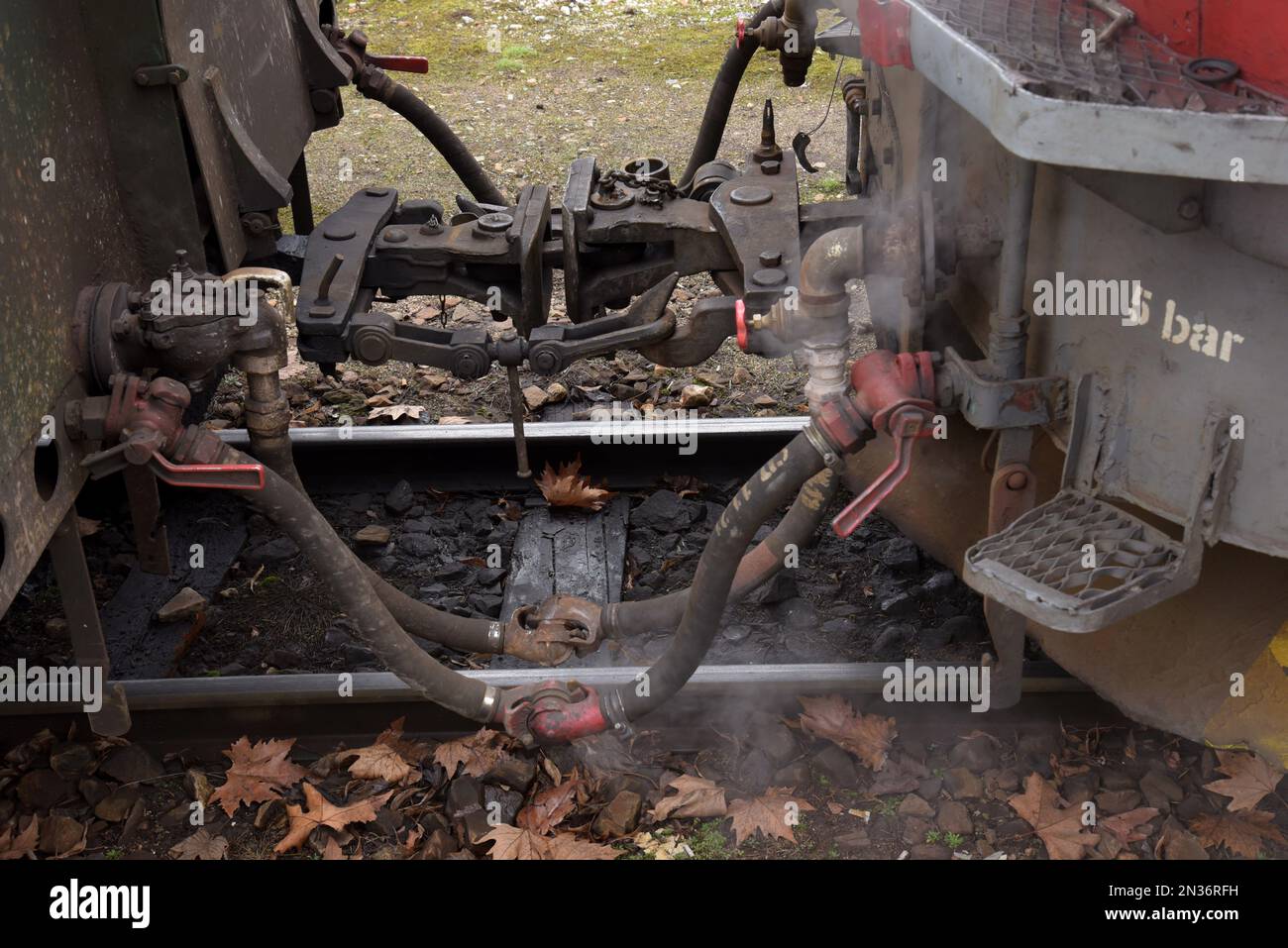 Steam leaking from steam heating pipes connecting carriages on the ...