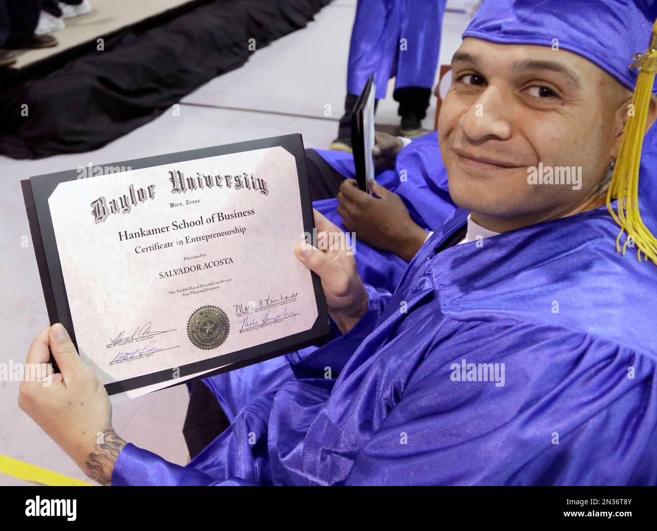 In this photo taken Dec. 12, 2014, prison inmate and graduate of the ...