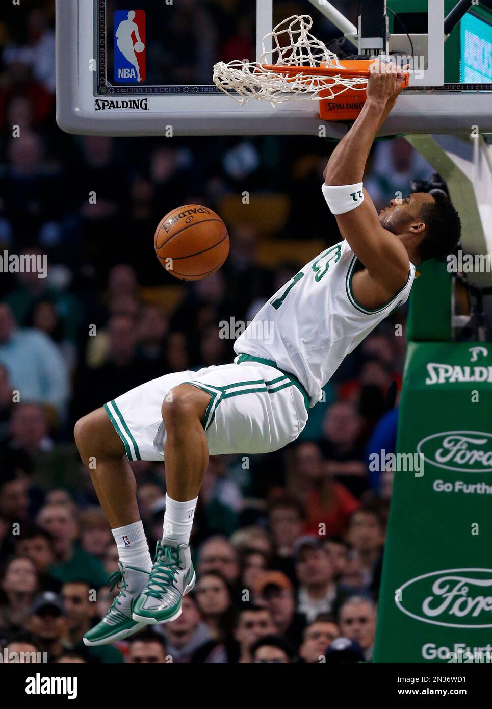 Boston Celtics' Evan Turner dunks during the third quarter of an NBA basketball game against the ...