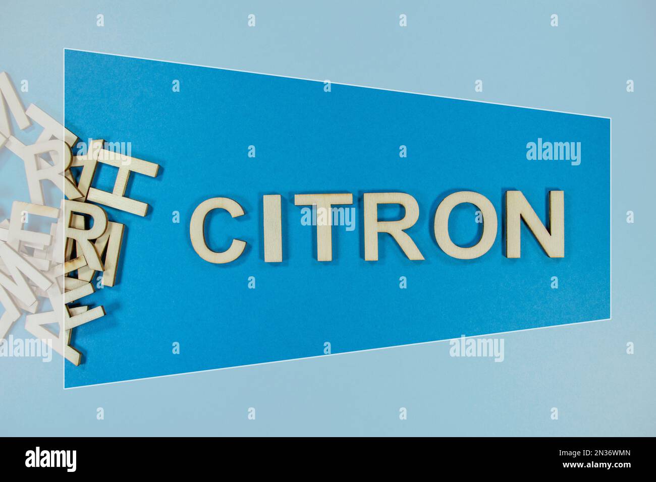 CITRON fruit in wooden English language capital letters spilling from a ...