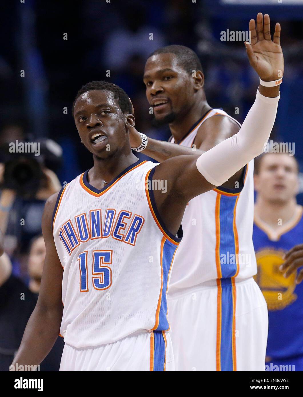 Oklahoma City Thunder forward Kevin Durant, right, pats teammate Reggie ...