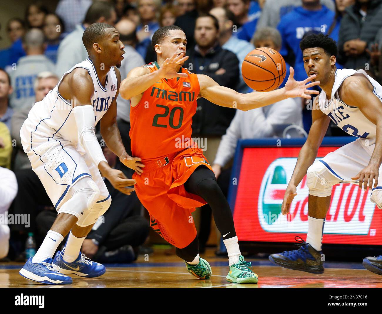 Miami's Manu Lecomte (20) battles Duke's Rasheed Sulaimon, left, and ...