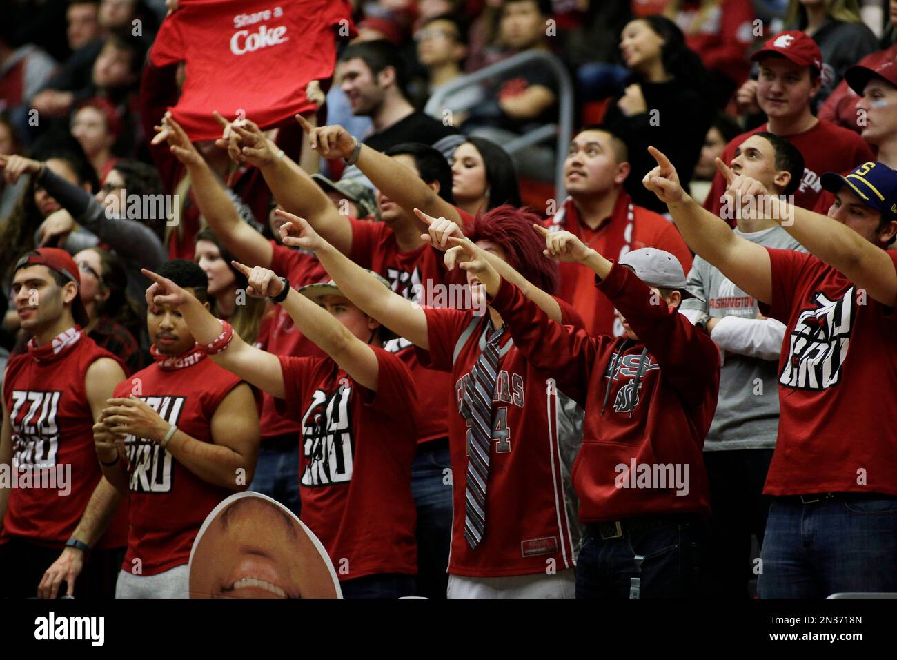 Fans in the Washington State student section cheer during the second ...