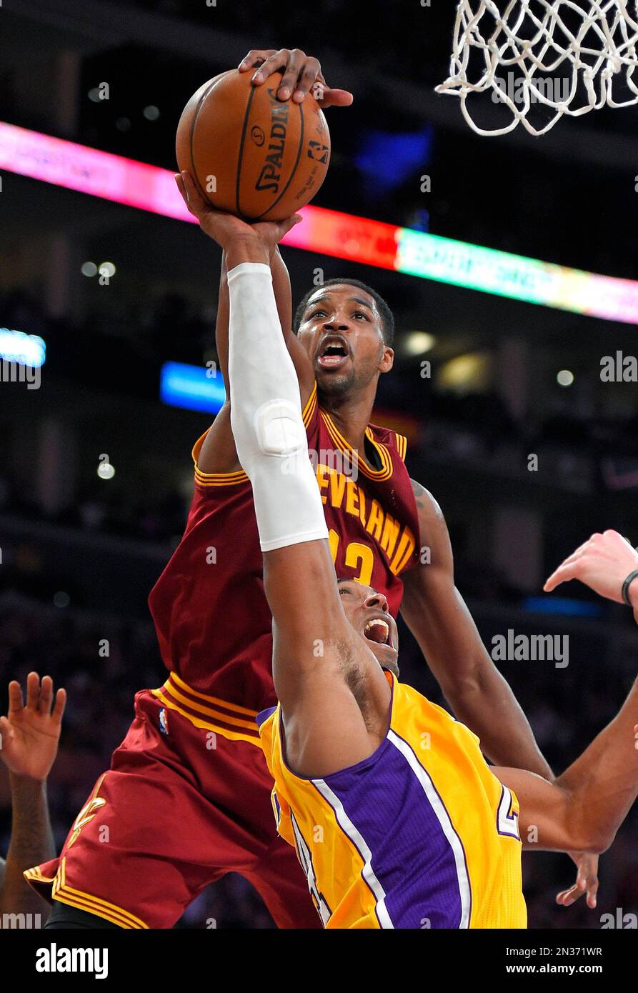 Los Angeles Lakers guard Kobe Bryant, below, has his shot blocked by ...