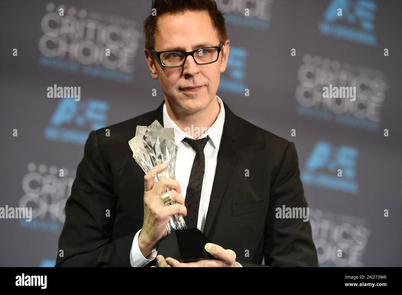 James Gunn poses in the press room with the best action movie award for ...